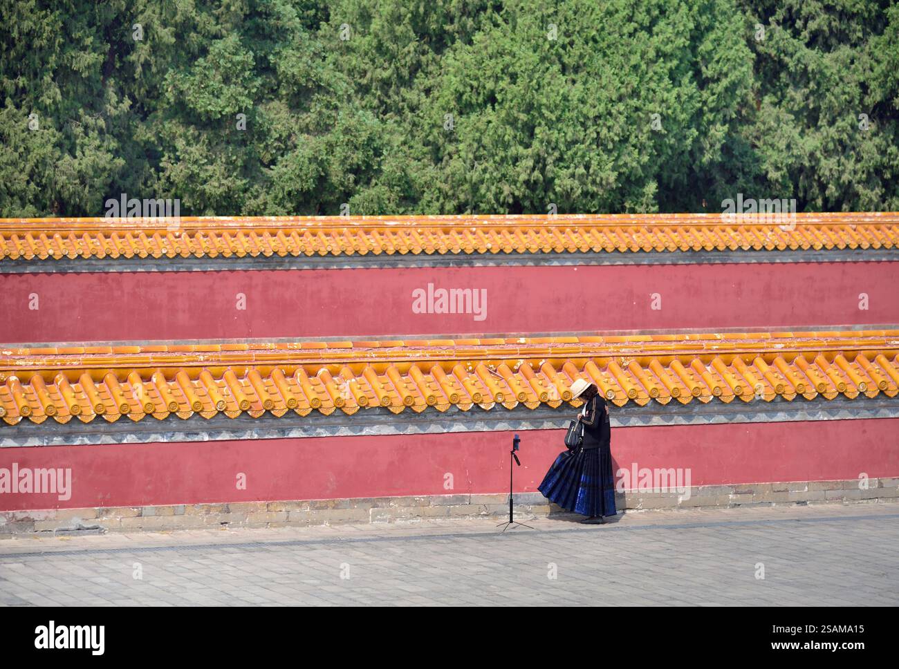 Tourist taking photos at the Temple of Earth (Ditan Temple), built in ...
