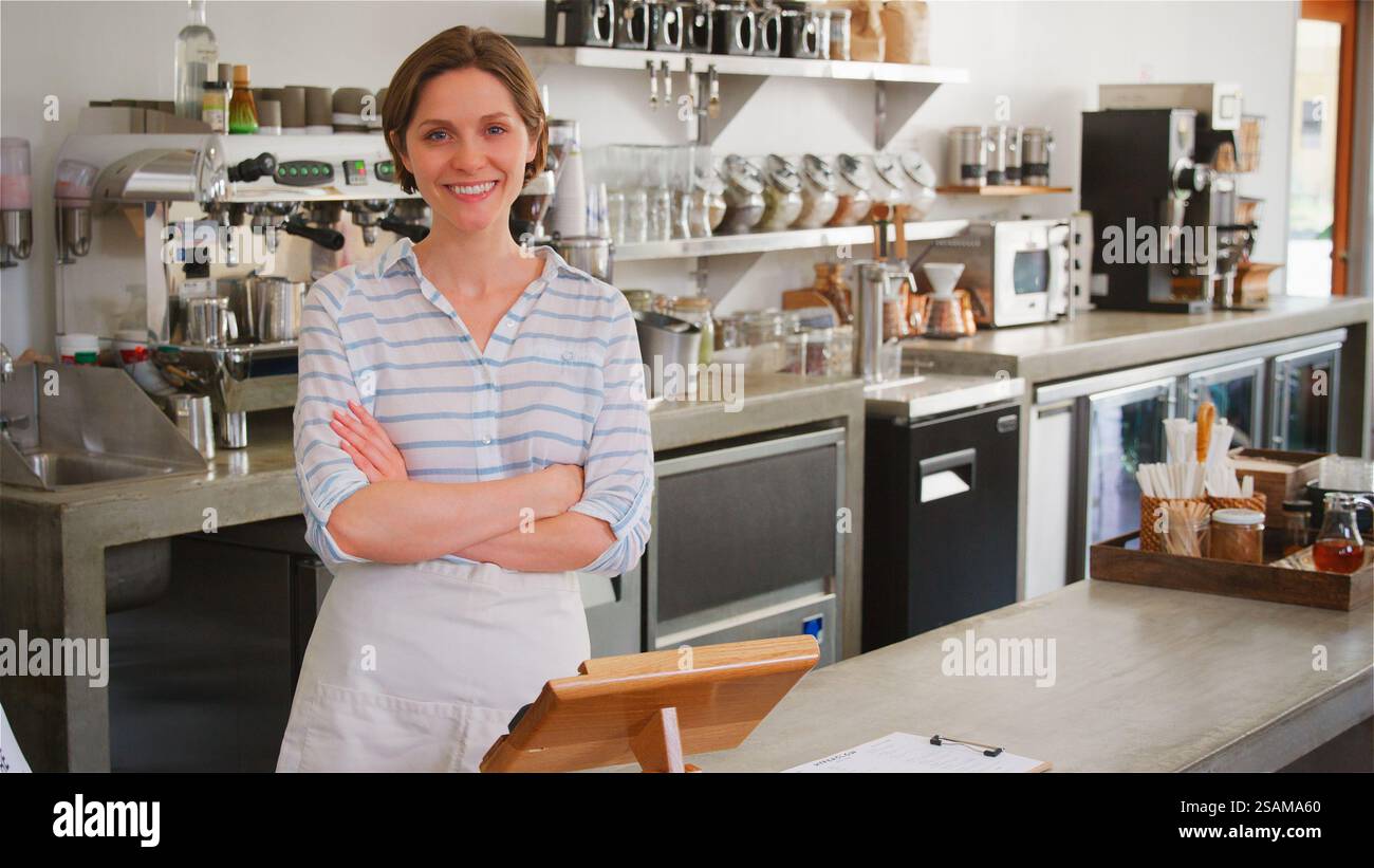 Portrait Of Smiling Female Owner Or Worker Behind Counter In Coffee ...