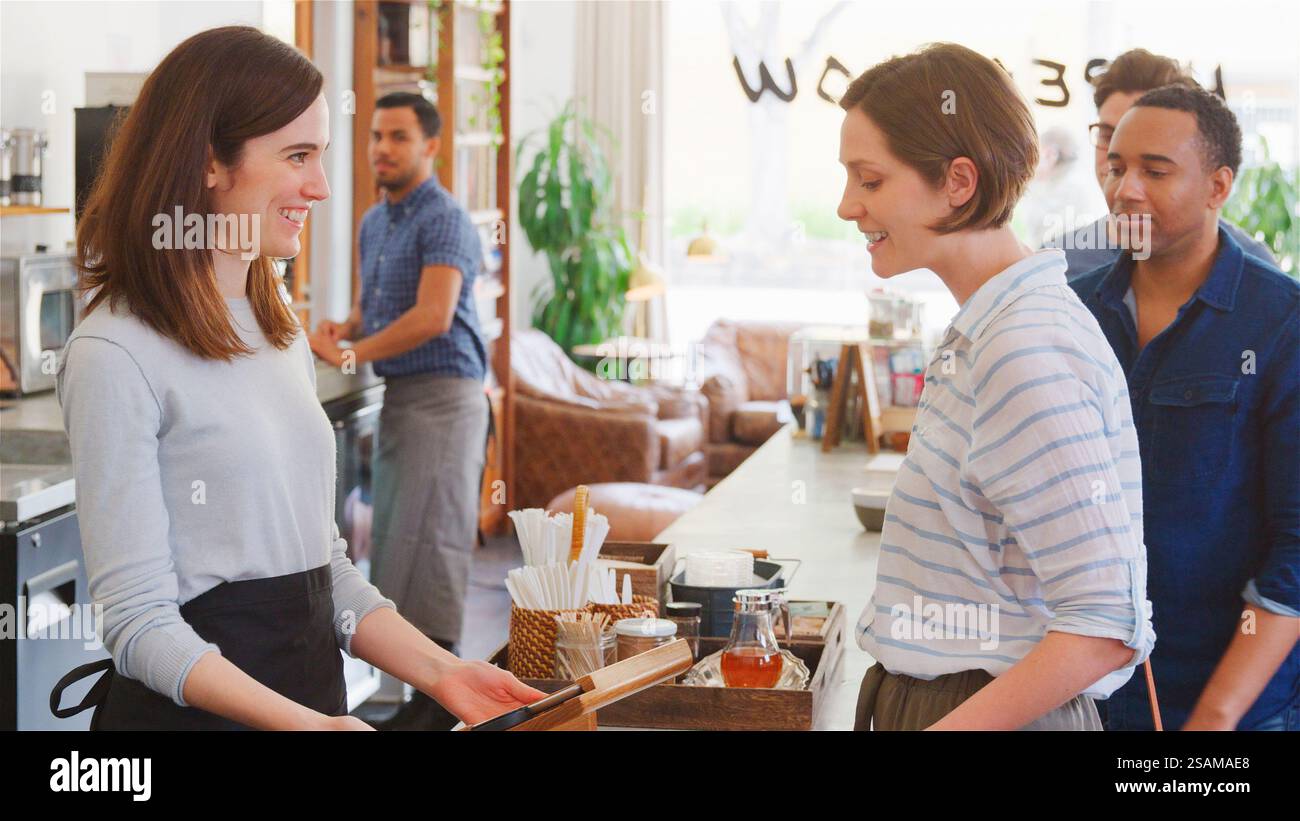 Coffee shop worker busy hi-res stock photography and images - Alamy