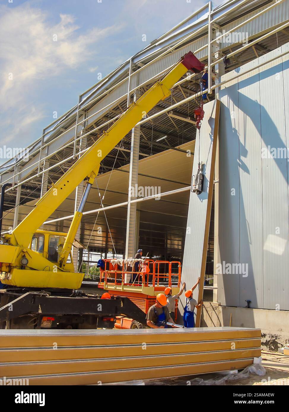 Installation process of sandwich panels on a metal framework of a cold ...