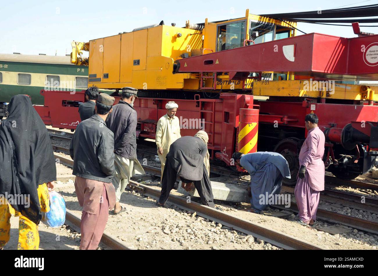 View of site after a train derailed as rescue operation is underway ...