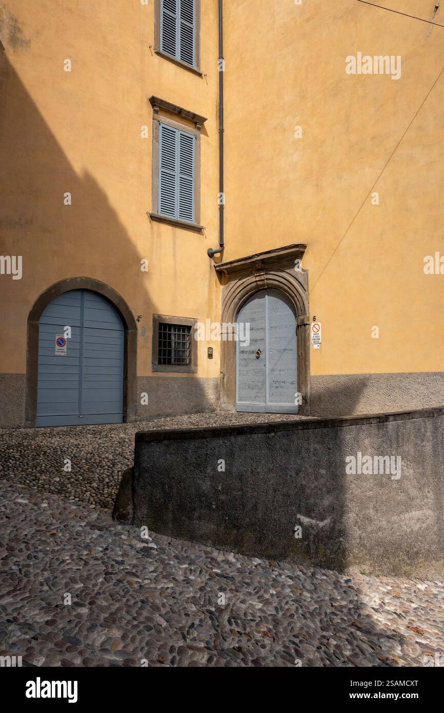 Traditional buildings in narrow streets of Bergamo, Italy Stock Photo ...