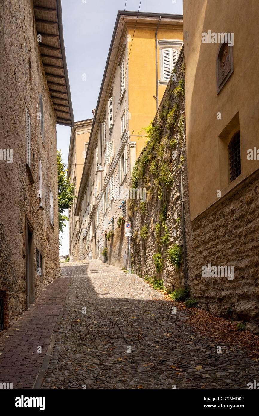 Traditional buildings in narrow streets of Bergamo, Italy Stock Photo ...