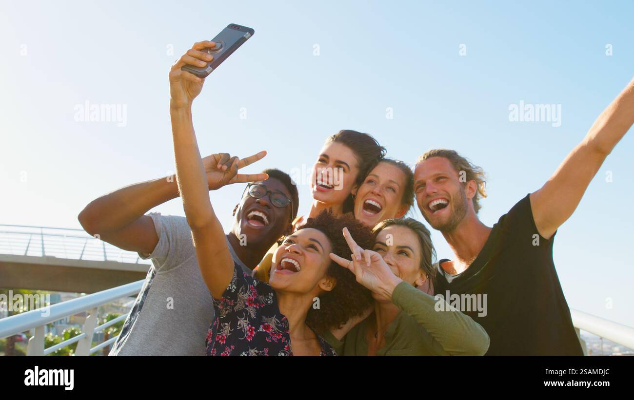 Group multi cultural friends posing hi-res stock photography and images ...