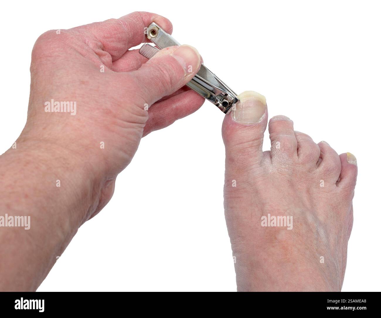 Horizontal shot of an old man trimming his toenail Stock Photo - Alamy