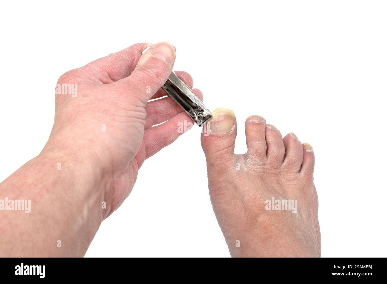 Horizontal shot of an old man trimming his toenail Stock Photo - Alamy