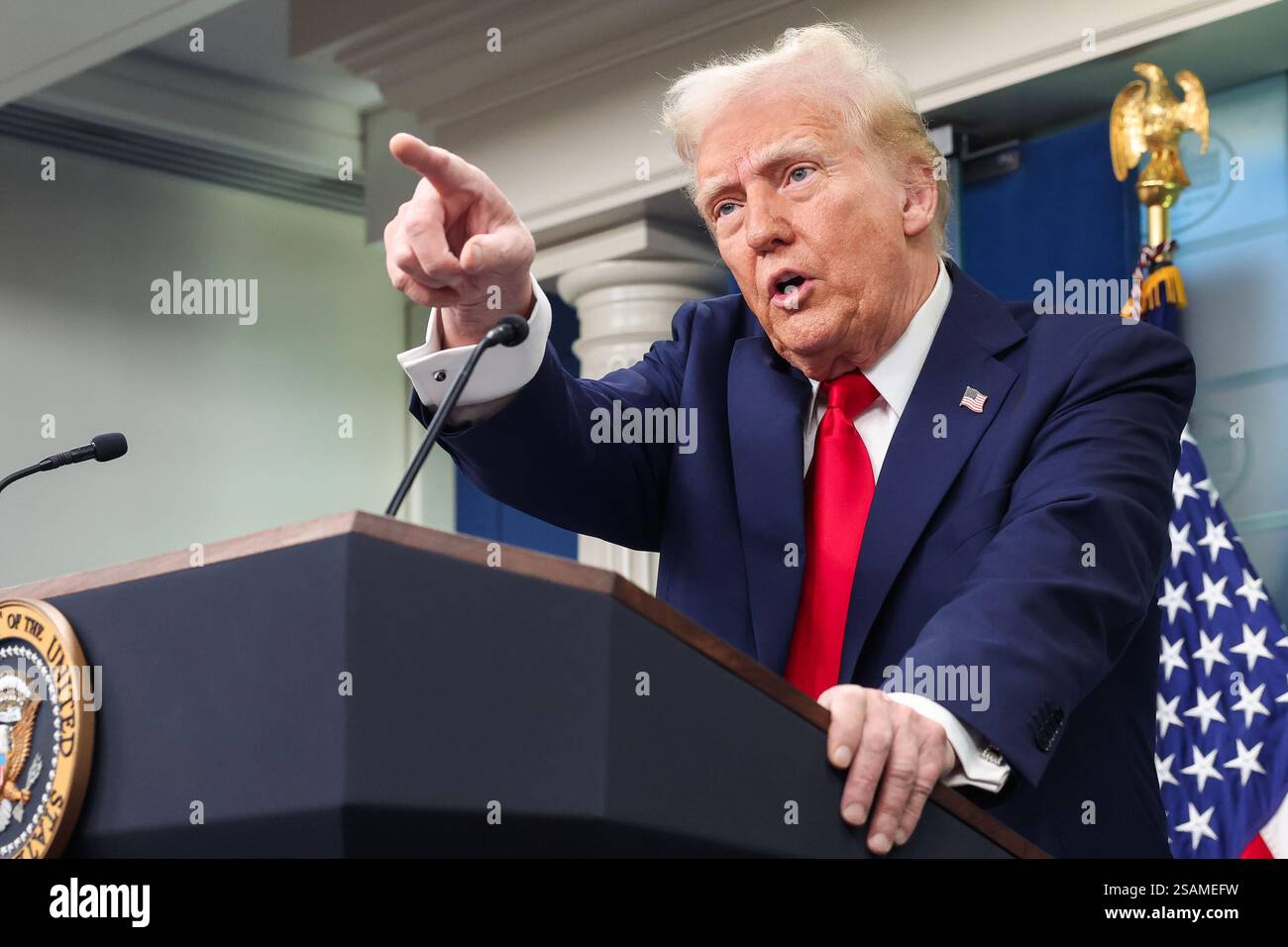 President Donald Trump takes questions from the press after delivering ...