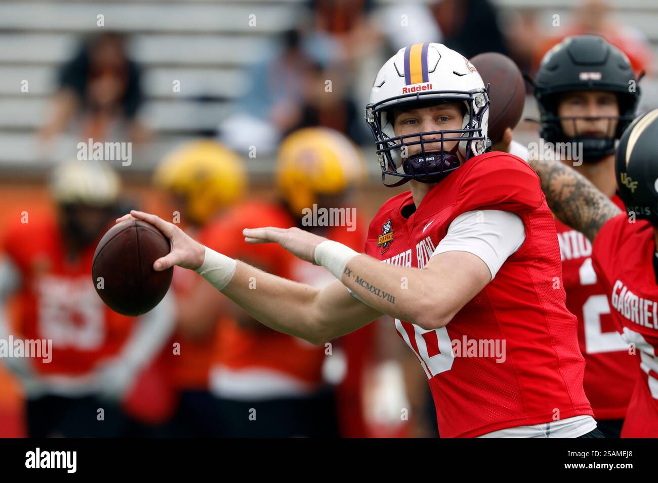 National team quarterback Taylor Elgersma, of Laurier in Canada, throws ...