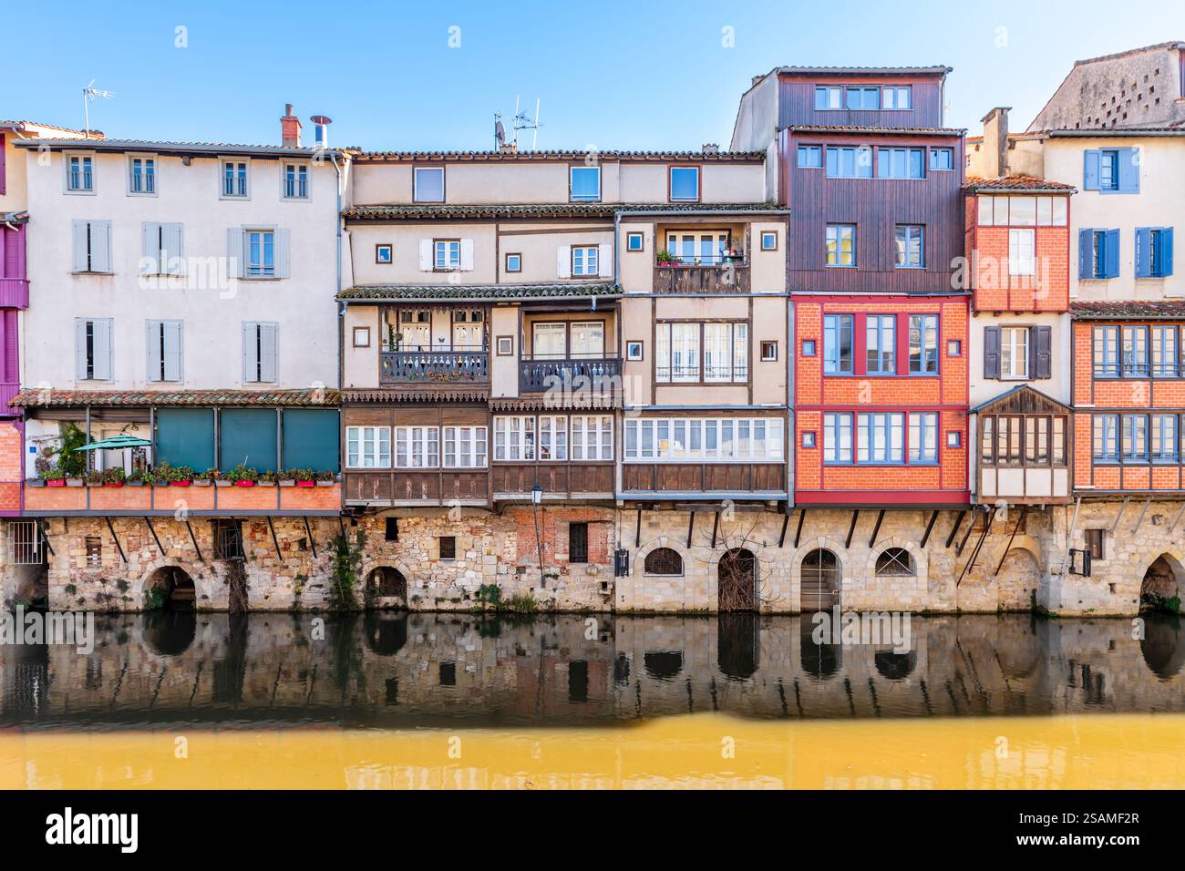 Facades of houses in the town of Castres on the Agout River in ...