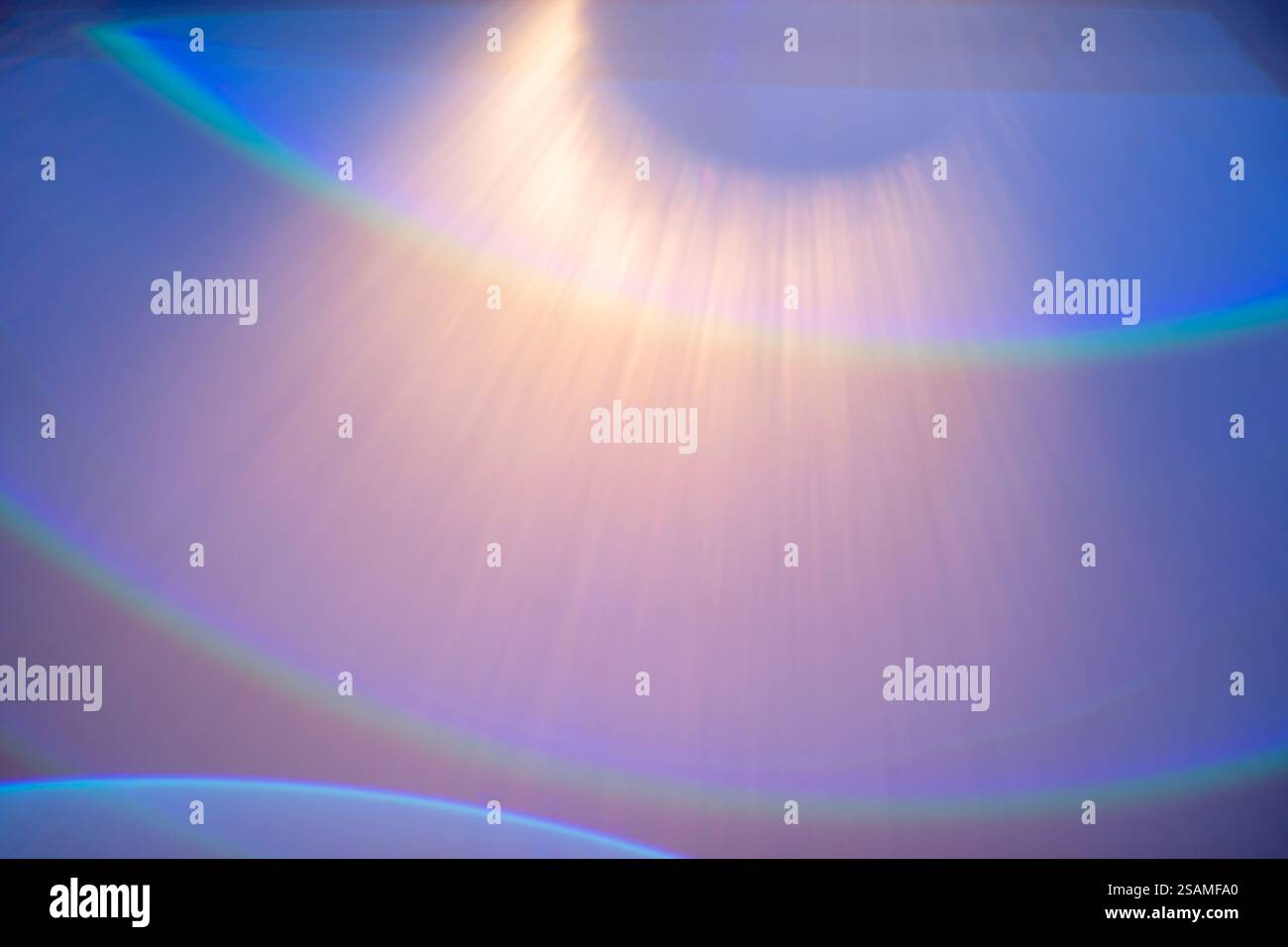 Dramatic light rays casting vibrant rainbow colors in a tranquil atmosphere. The diffusion ...