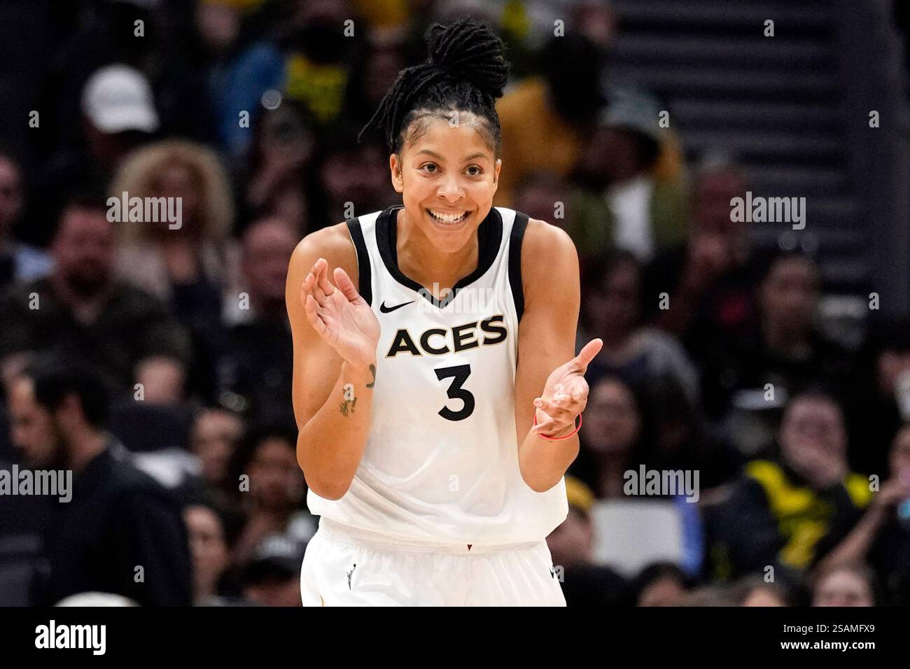 FILE - Former Las Vegas Aces forward Candace Parker reacts during the ...
