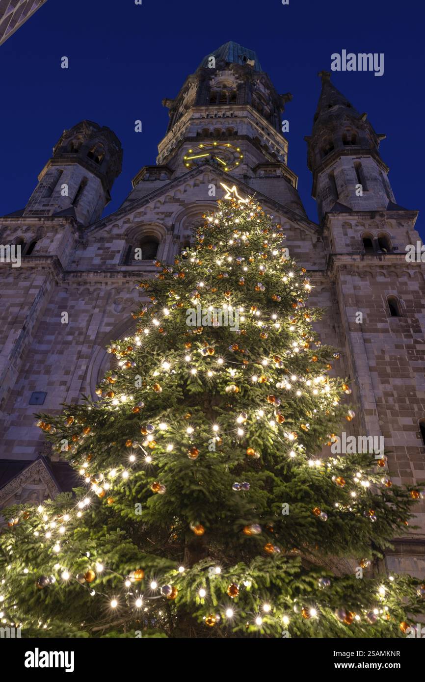 Illuminated Christmas tree in front of the Kaiser Wilhelm Memorial ...