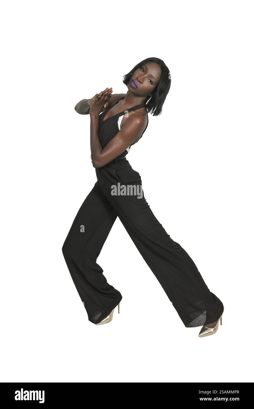 Beautiful young black woman dancing the night away Stock Photo - Alamy