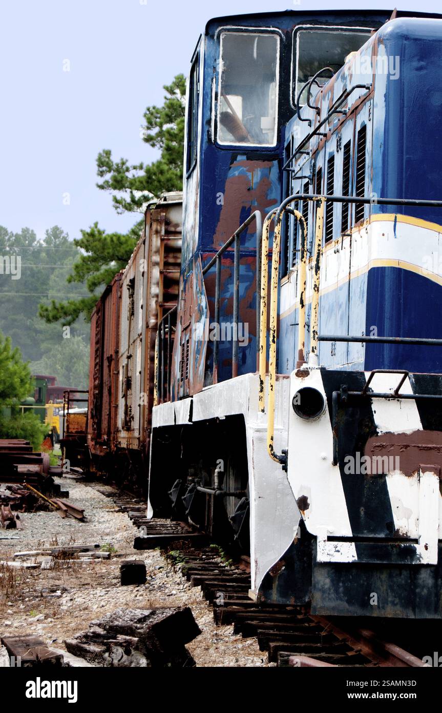 A Diesel Train Engine on railroad train tracks Stock Photo - Alamy