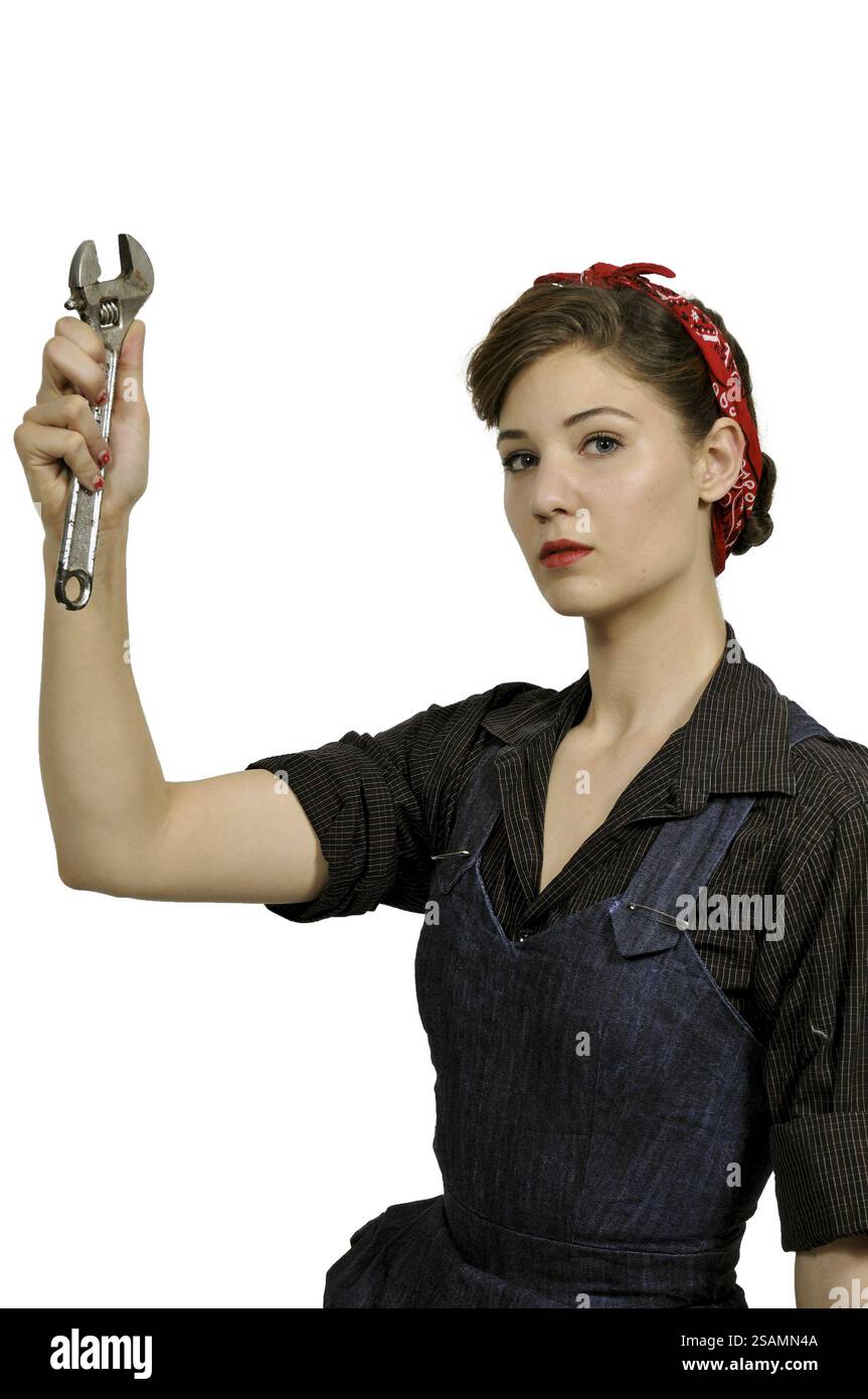 Beautiful woman dressed as the iconic Rosie the Riveter Stock Photo - Alamy