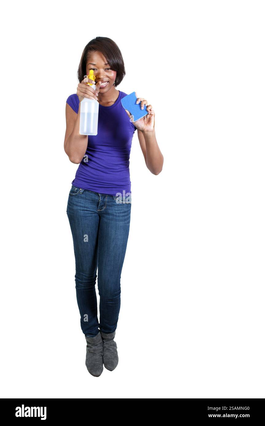An African American glove wearing beautiful woman or maid cleaning ...