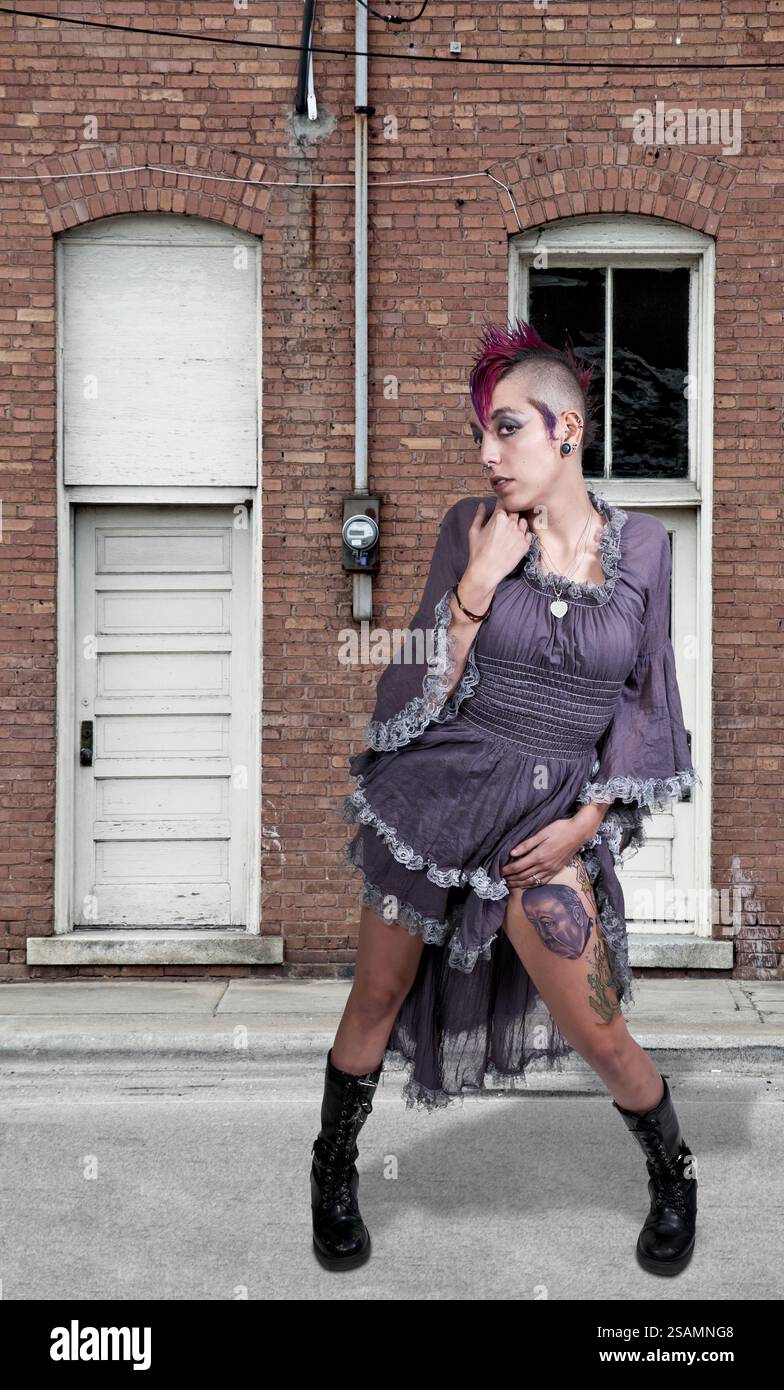 Beautiful young punk rock alternative lifestyle woman Stock Photo - Alamy