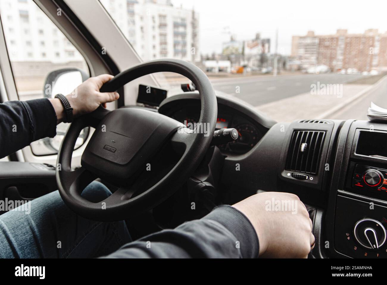 Car navigating urban roads in hi-res stock photography and images - Alamy