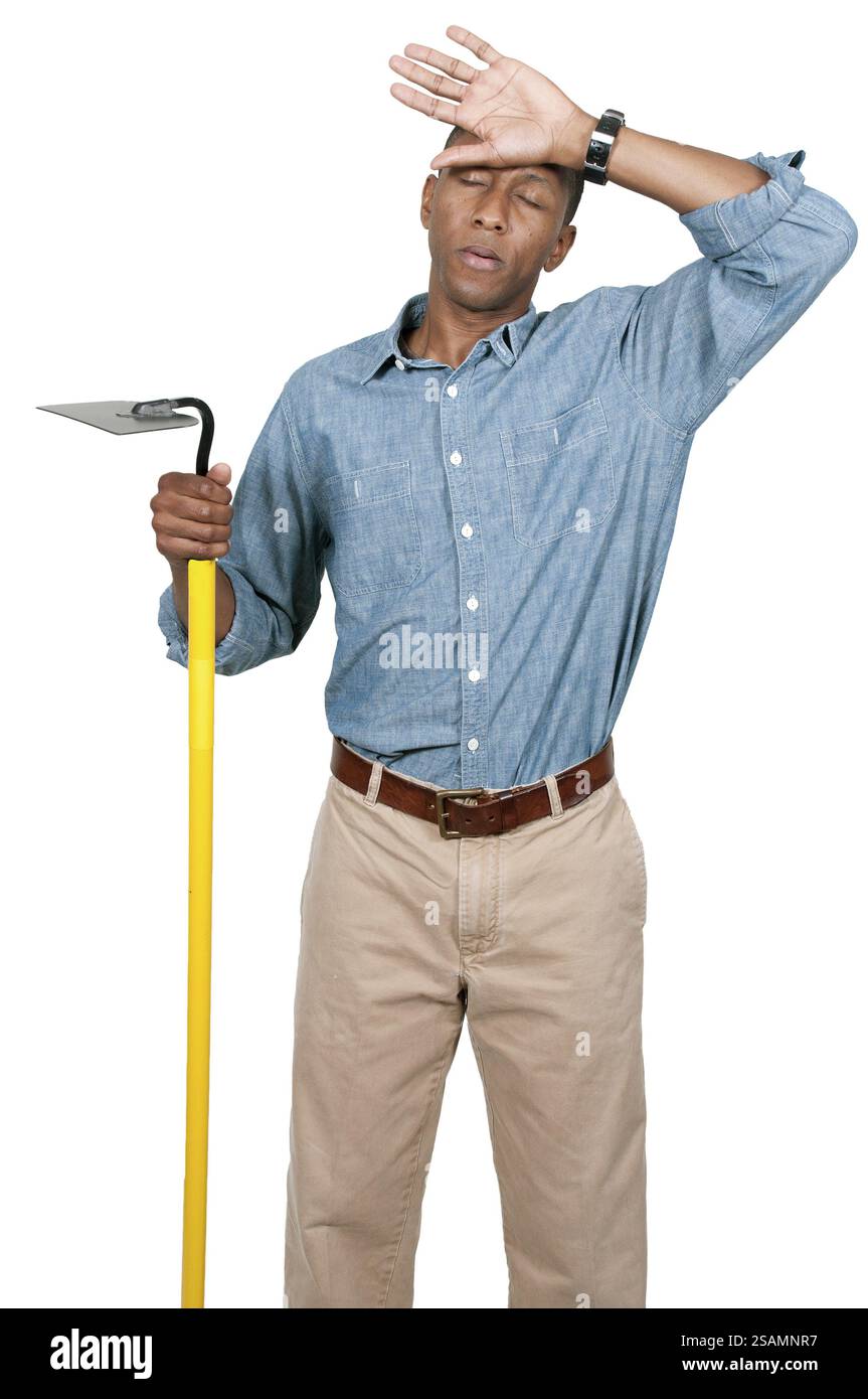 Man working plowing land Cut Out Stock Images & Pictures - Alamy