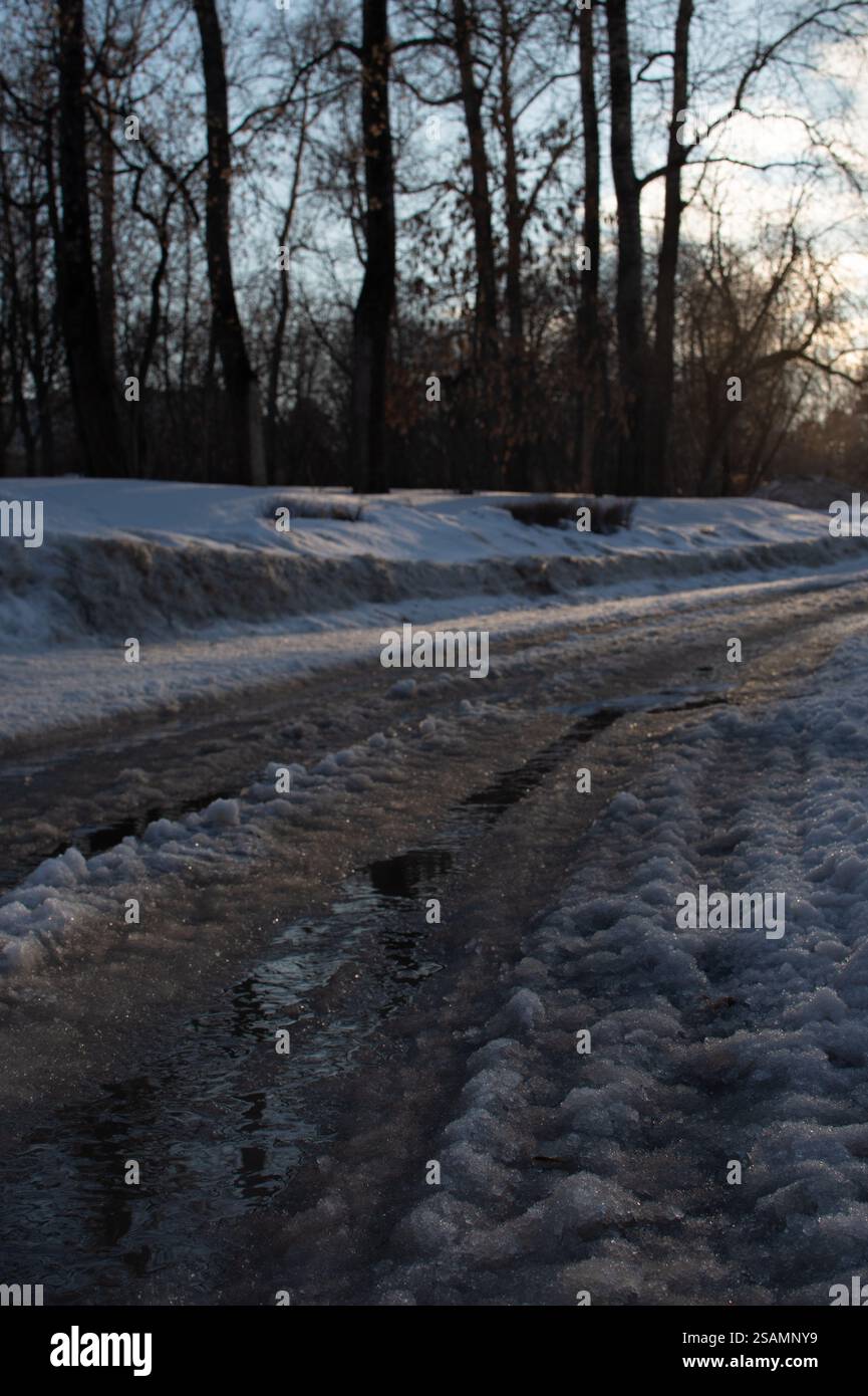 Melting ice on a road hi-res stock photography and images - Alamy