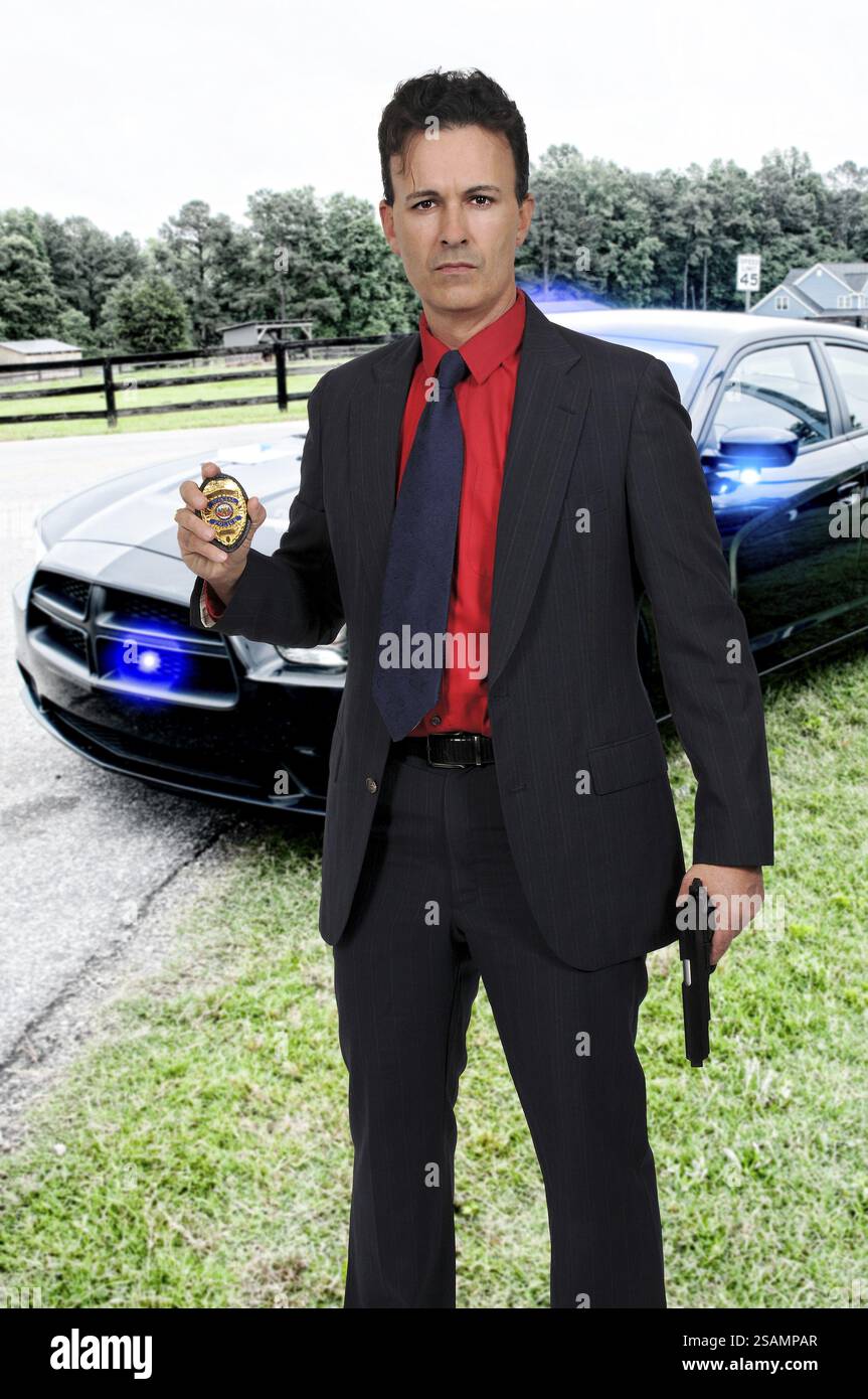 Police detective man on the job with a gun Stock Photo - Alamy