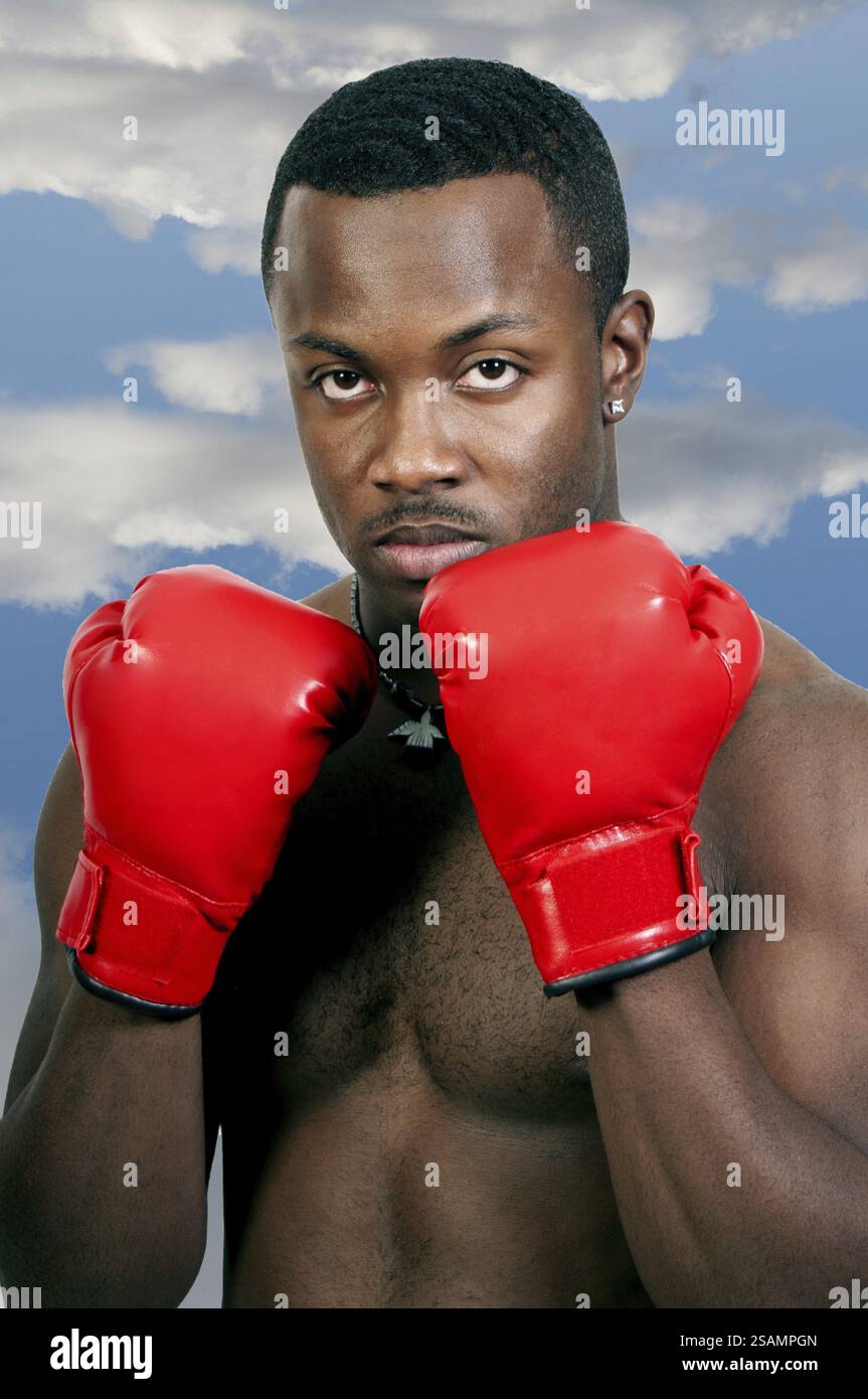 A black African American man athletic boxer with boxing gloves Stock ...