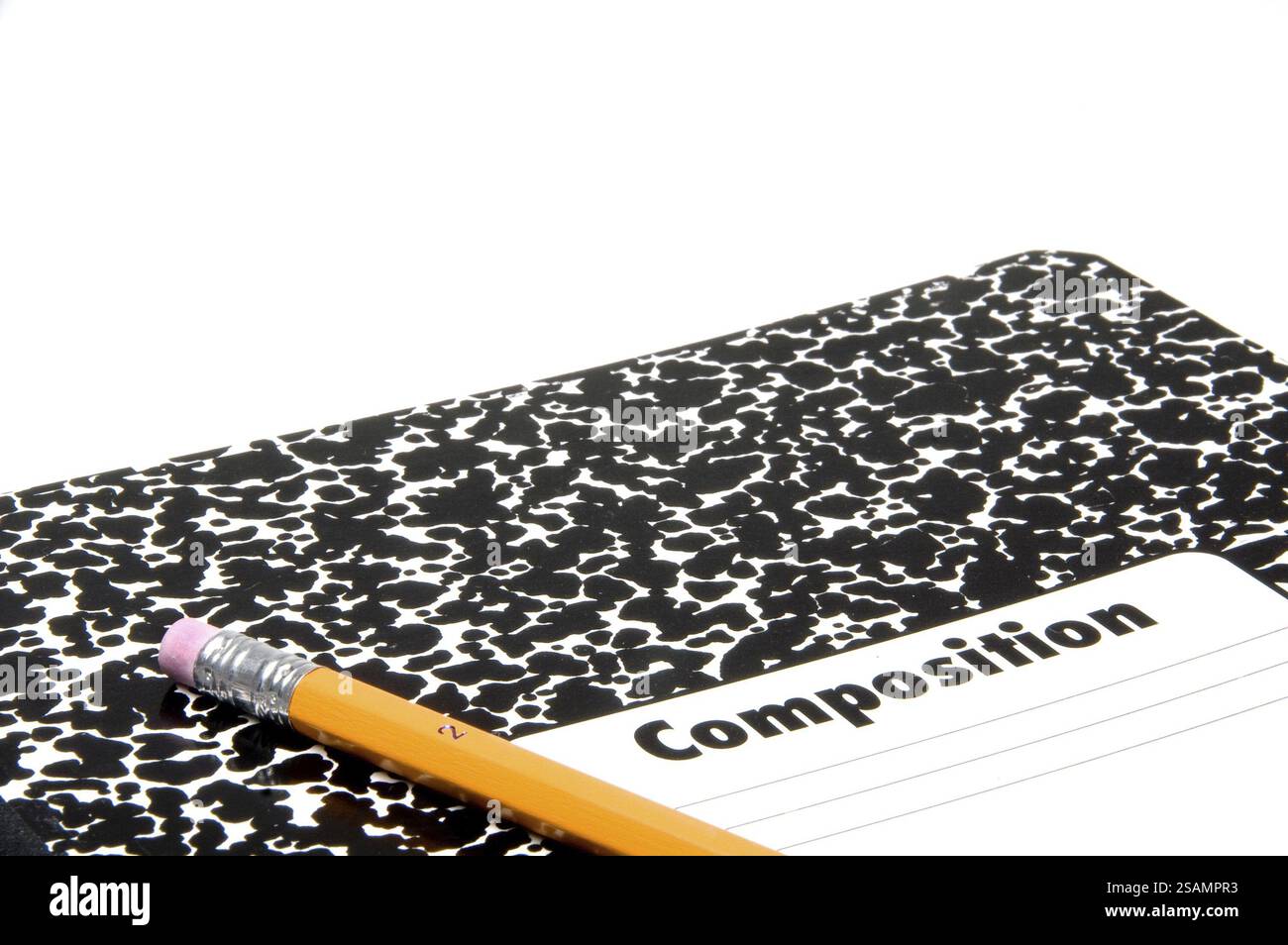 A number 2 pencil and a composition book Stock Photo - Alamy