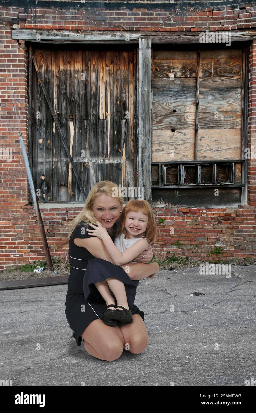 Beautiful young mother and her beautiful daughter Stock Photo - Alamy
