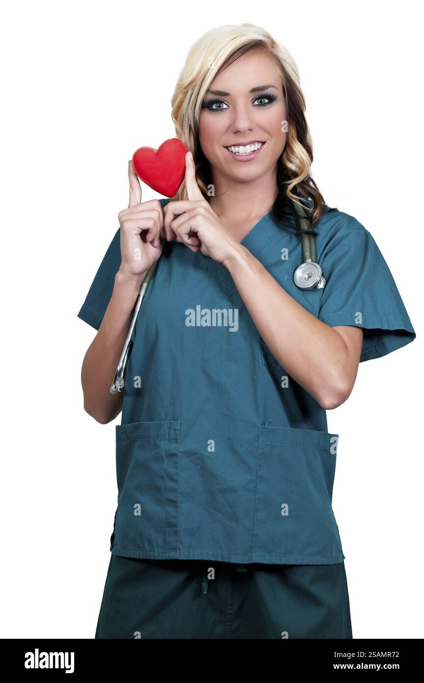 A female cardiologist woman doctor holding a red heart Stock Photo - Alamy