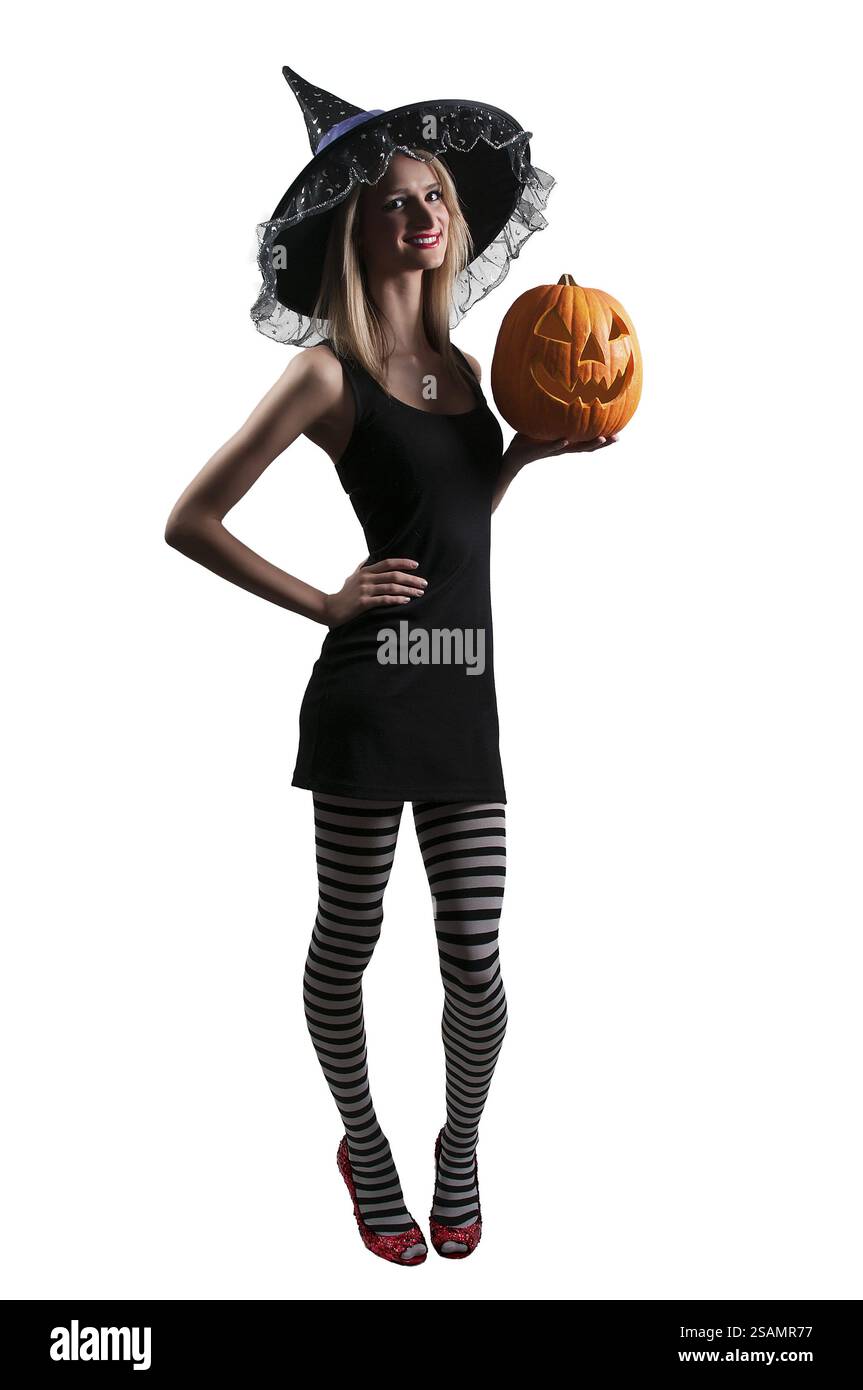 Beautiful woman wicked witch with ruby shoes Stock Photo - Alamy