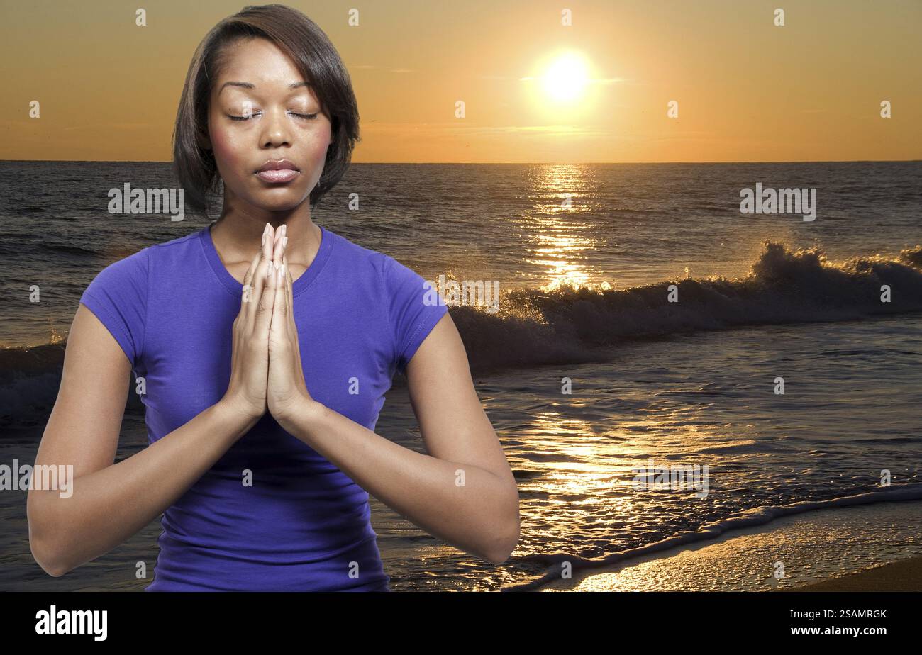 Beautiful Christian woman in deep prayer Stock Photo - Alamy