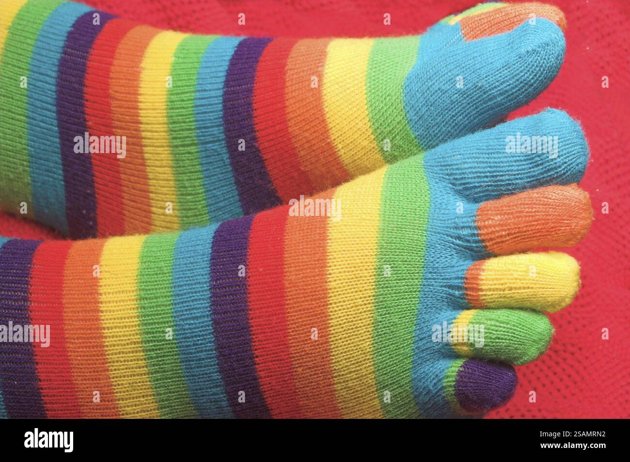 Clean and colorful striped knitted toe socks Stock Photo - Alamy