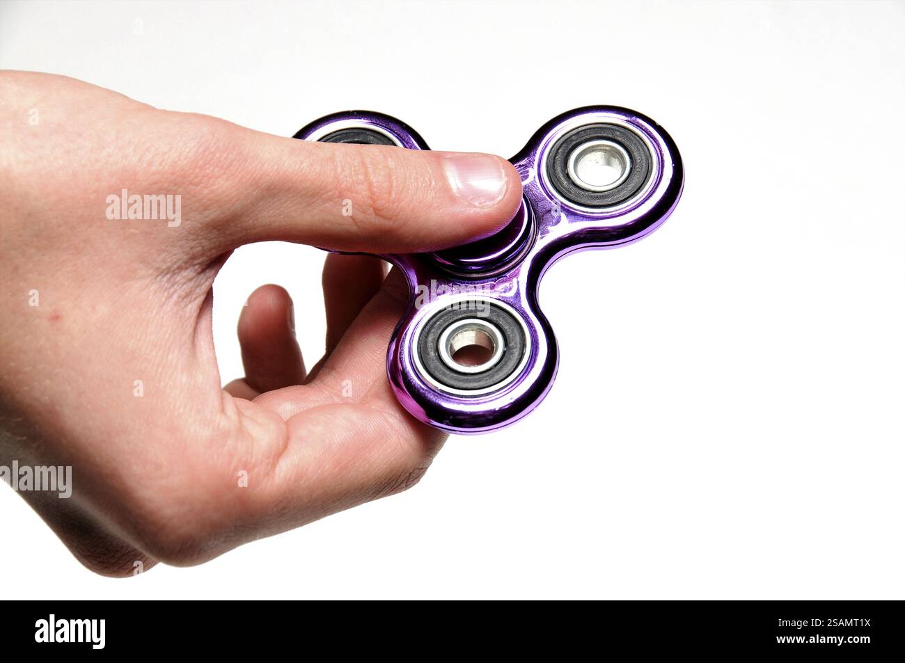 Popular fidget spinner toy that is the latest fad Stock Photo - Alamy