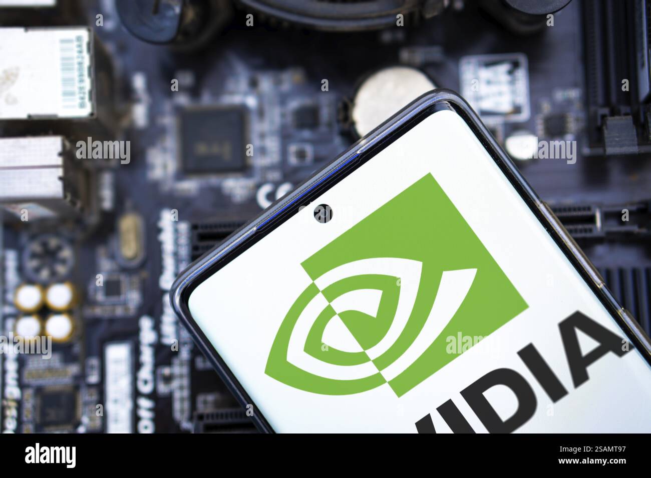 NVIDIA logo on phone and blurred chip on the background-Dhaka ...