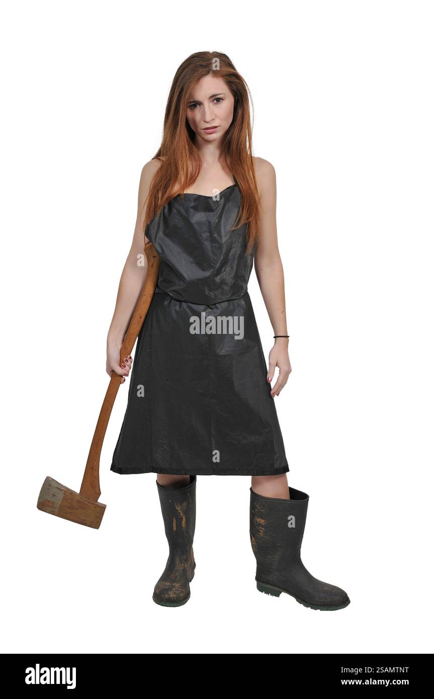 Beautiful possessed woman in a trance holding an axe Stock Photo - Alamy