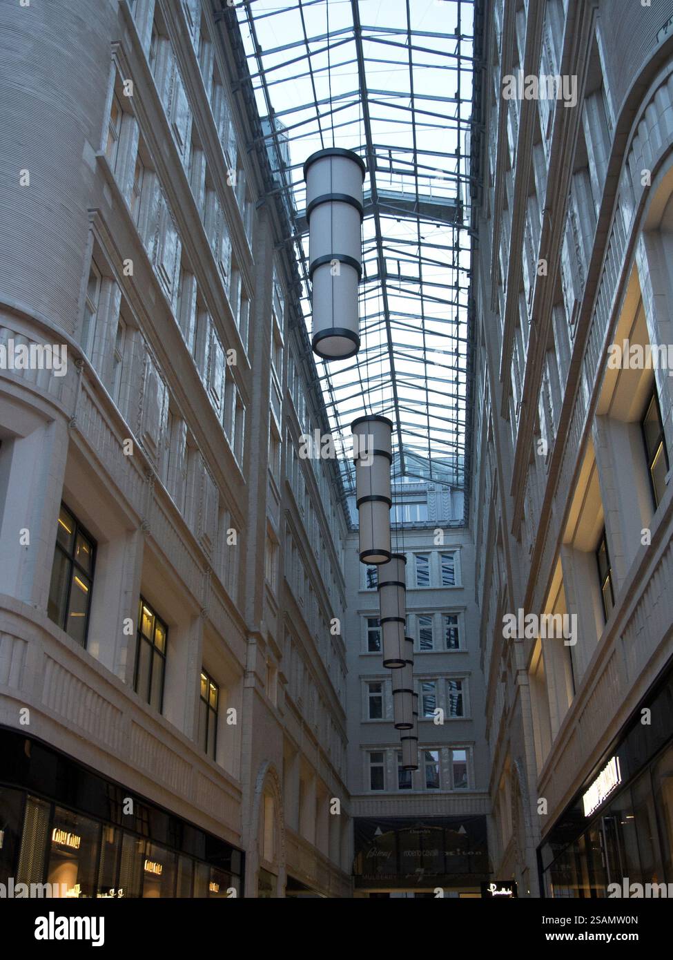 High arcade with modern glass roof and geometric architecture, Vienna ...