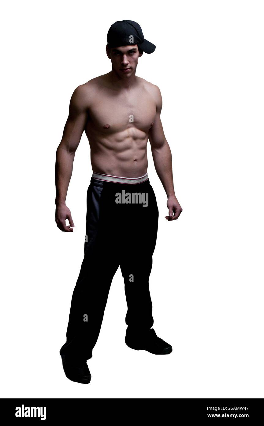 Beautiful atteactive young fit muscular man standing Stock Photo - Alamy