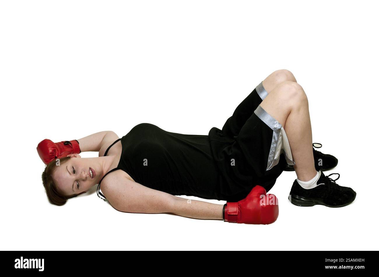 Beautiful young unconcious knocked out woman boxer with gloves Stock ...