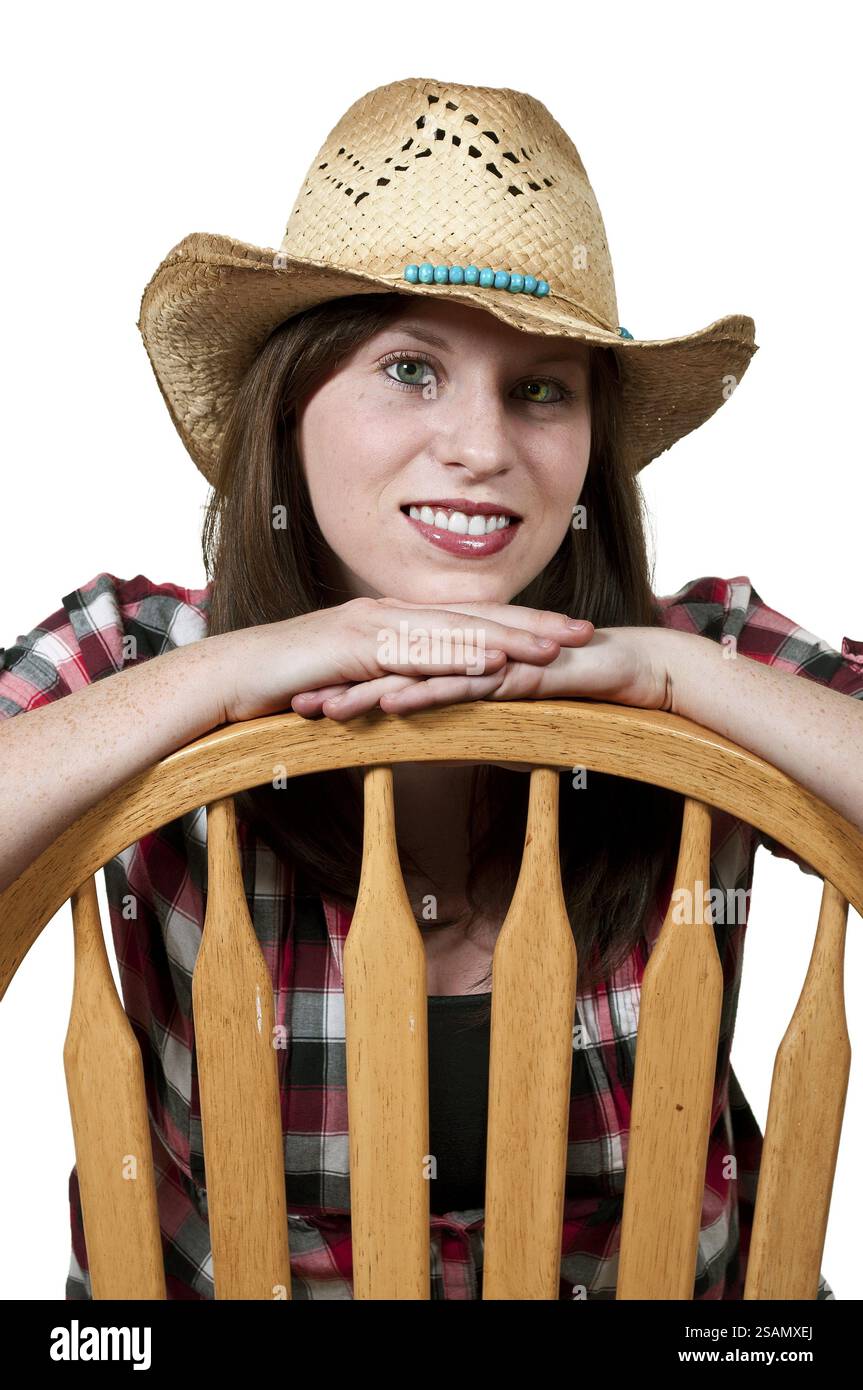 Beautiful young country girl woman wearing a stylish cowboy hat Stock Photo - Alamy