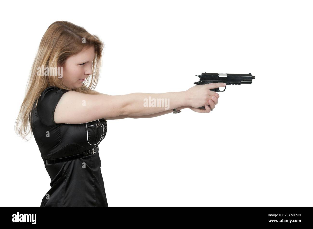 Beautiful woman with a loaded handgun pistol Stock Photo - Alamy