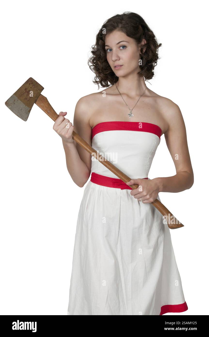 Beautiful possessed woman in a trance holding an axe Stock Photo - Alamy