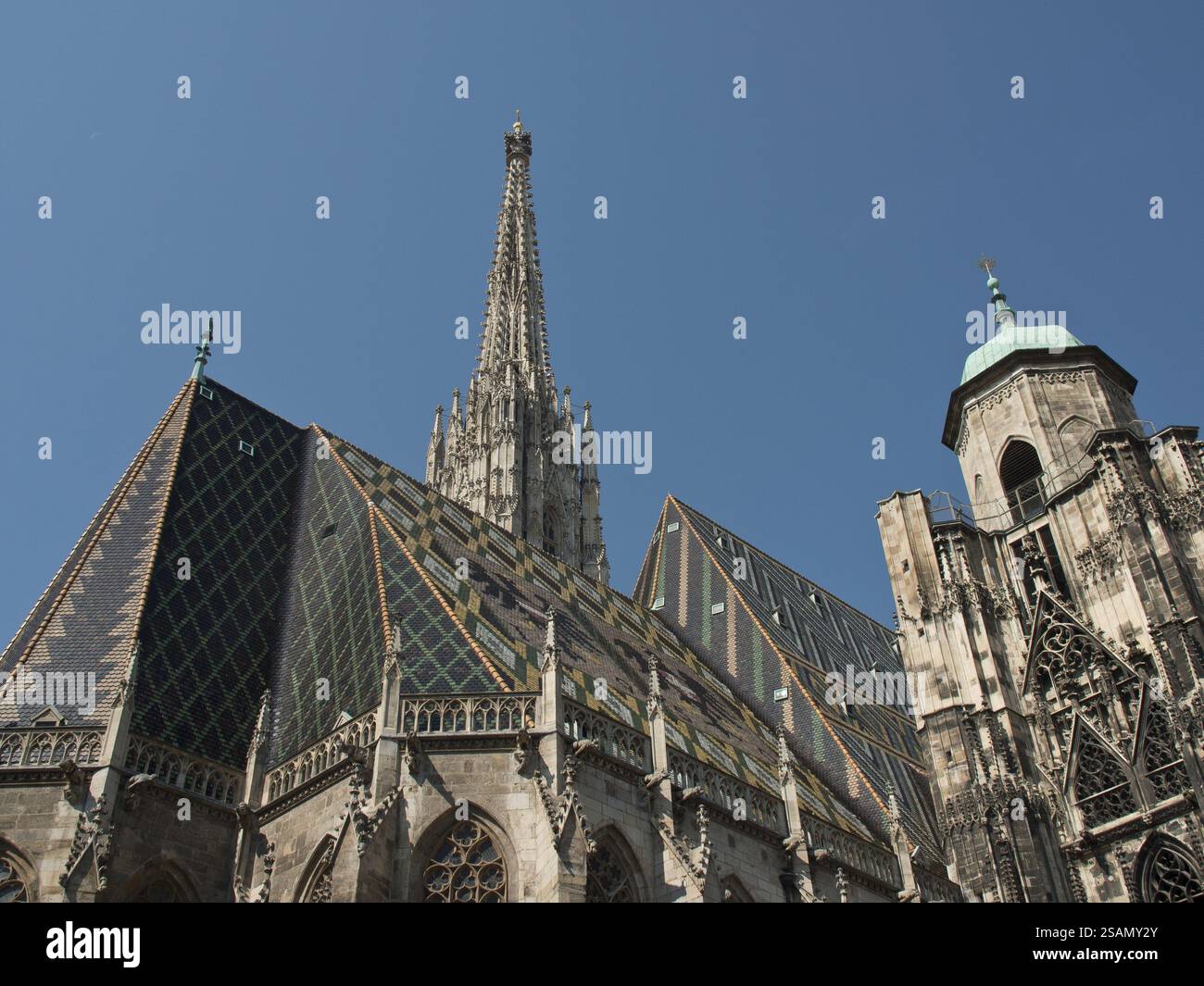 Majestic Gothic cathedral with ornately decorated roofs and towers ...