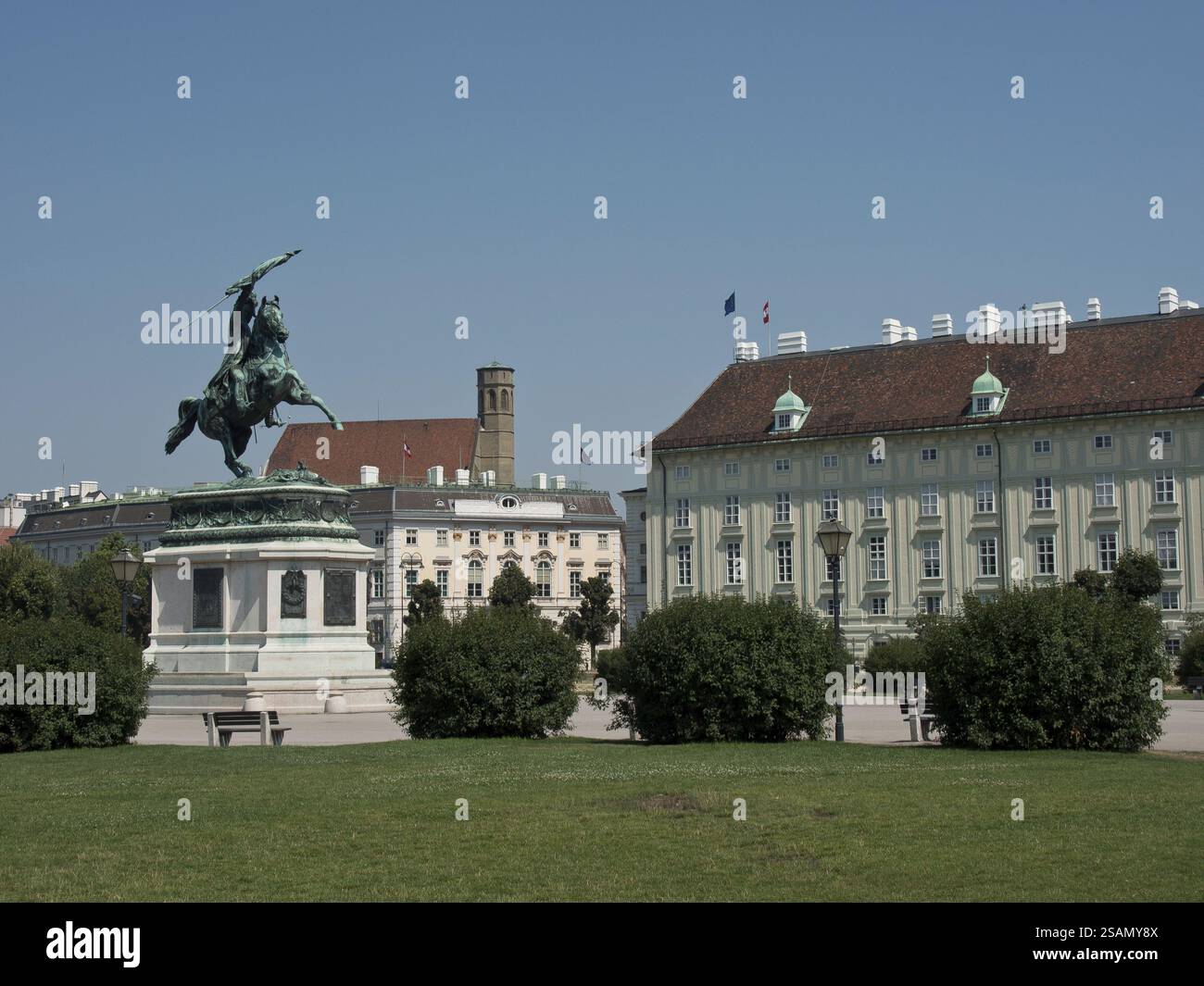 Monumental equestrian statue on an open square in front of historic ...