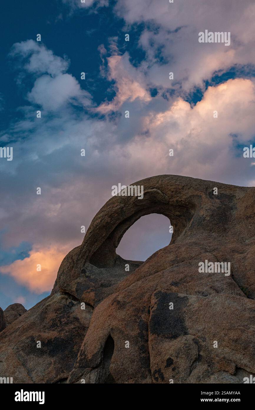 An arch formation in the boulders and geological formations of the ...