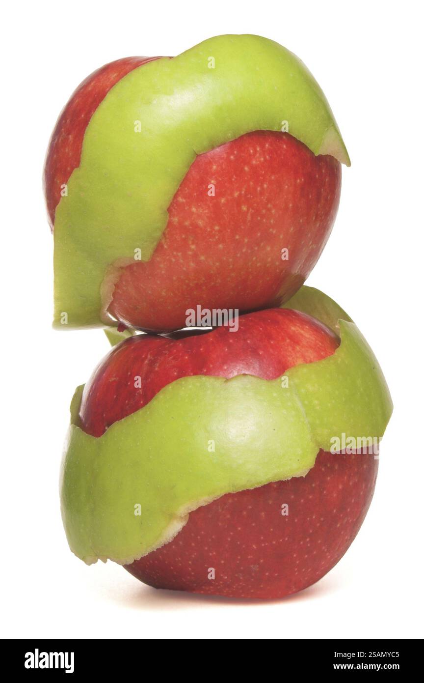 Two red apples wrapped in a Granny Smith apple peel Stock Photo - Alamy