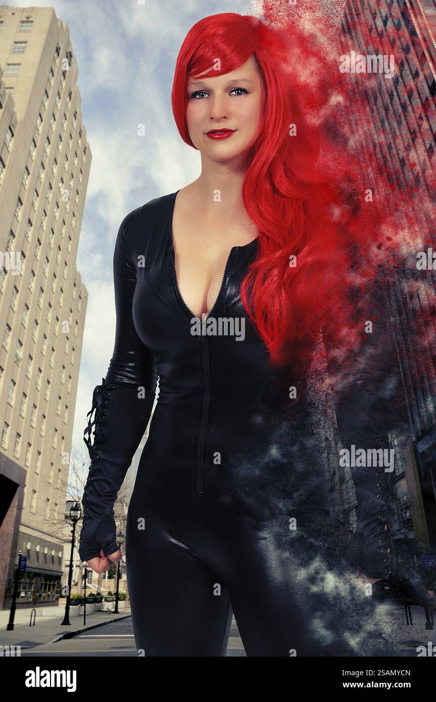 Beautiful woman wearing a black vinyl rubber latex cat suit Stock Photo ...