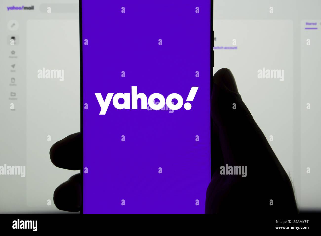 Yahoo logo on phone screen stock image Stock Photo - Alamy