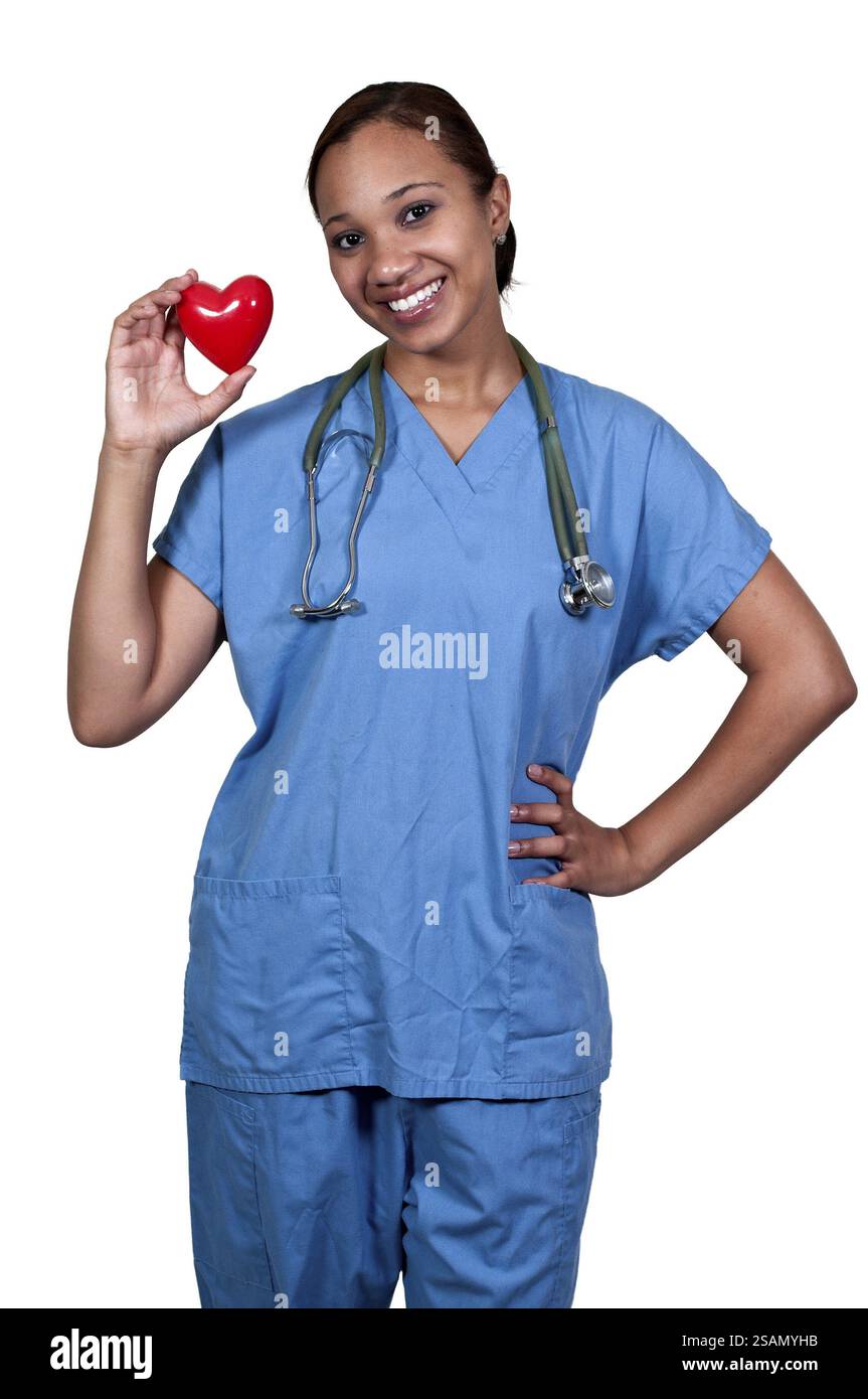 A female cardiologist woman doctor holding a red heart Stock Photo - Alamy
