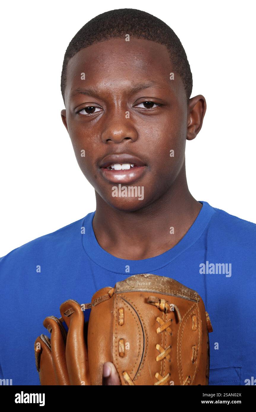 A black African American teenage man baseball pitcher getting ready to ...