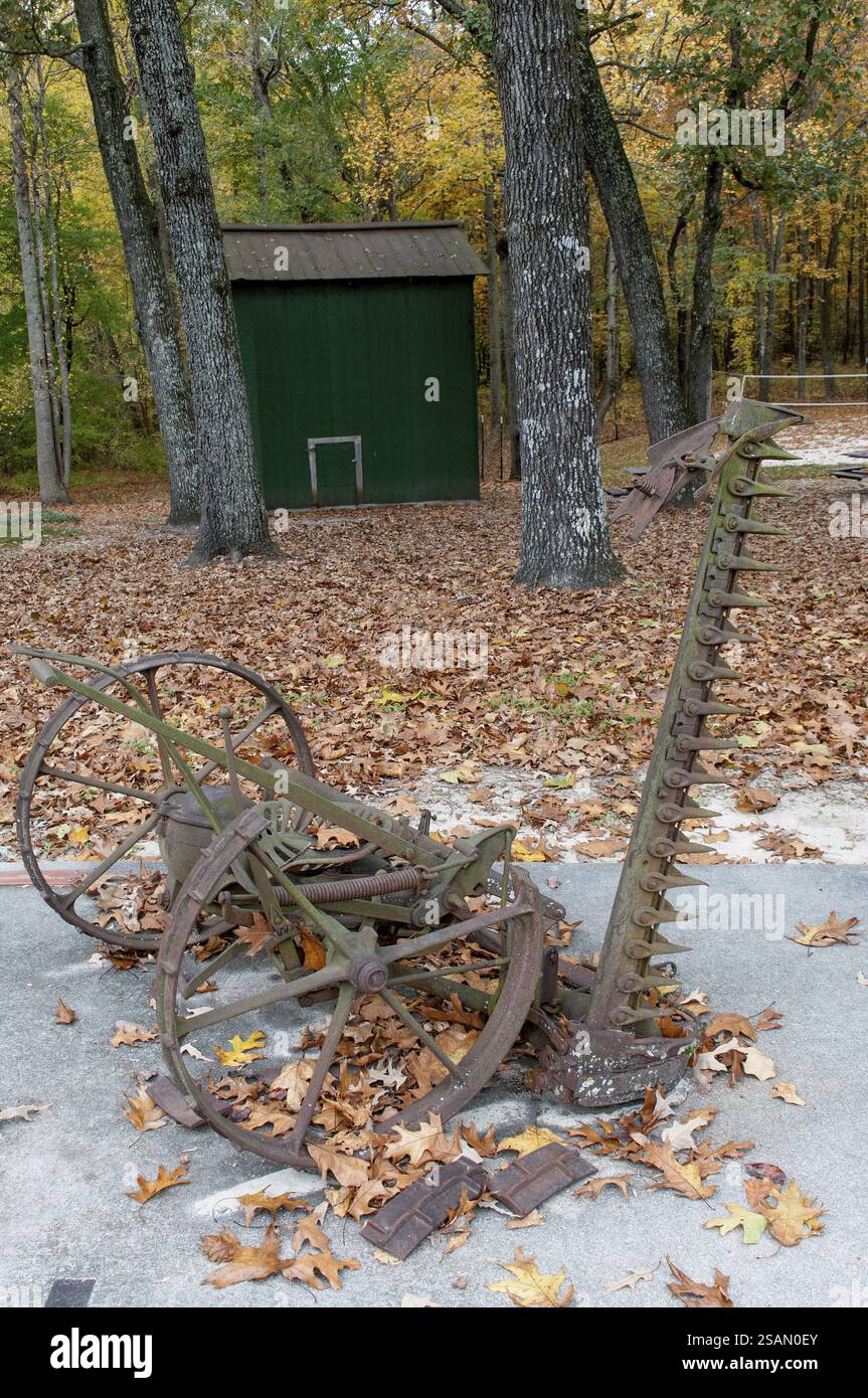 Vintage old fashioned hay mower on a farm Stock Photo - Alamy